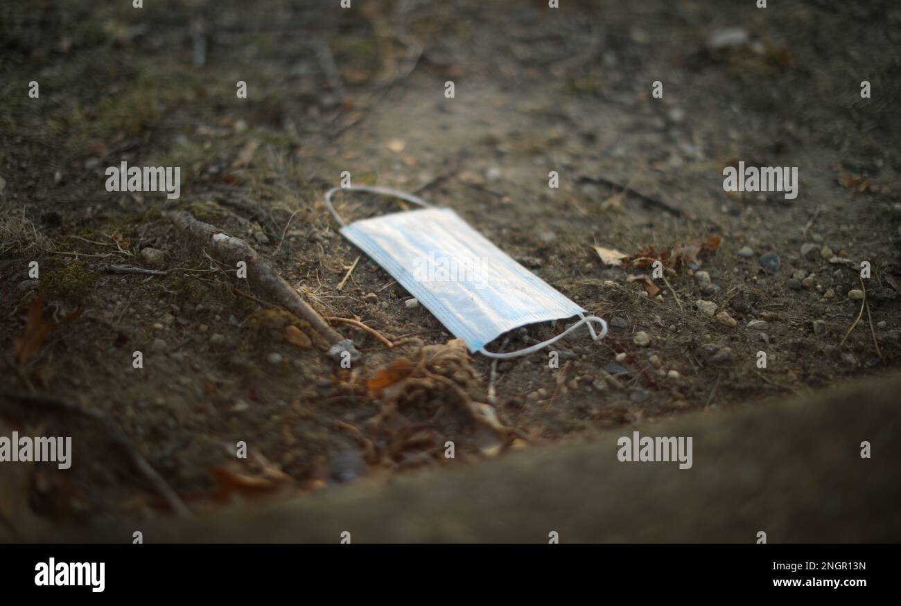 Trash on the street showing environmental issue Stock Photo - Alamy