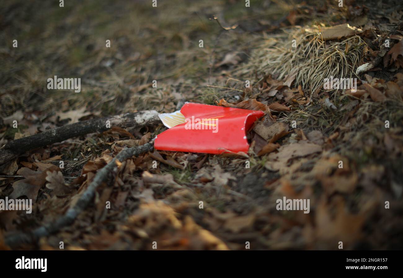 Trash on the street showing environmental issue Stock Photo - Alamy