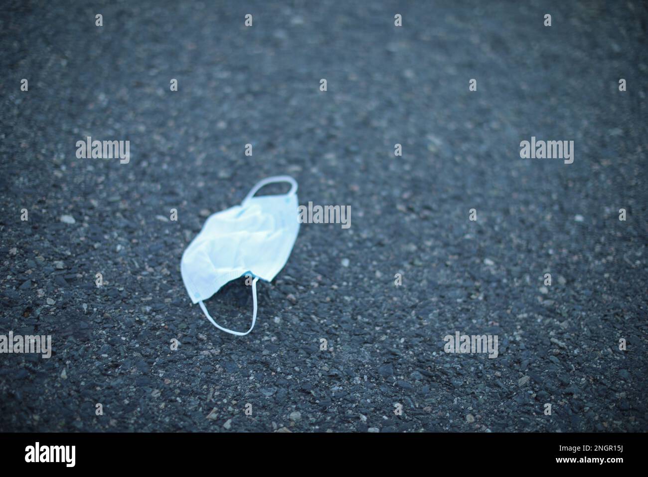Trash on the street showing environmental issue Stock Photo - Alamy