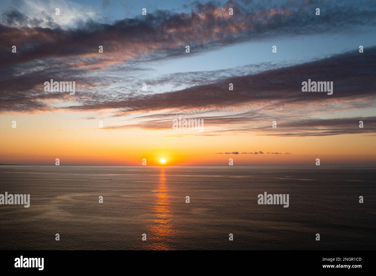 Beautiful sunset background from the colorful beams on the sky. Sunrise ...