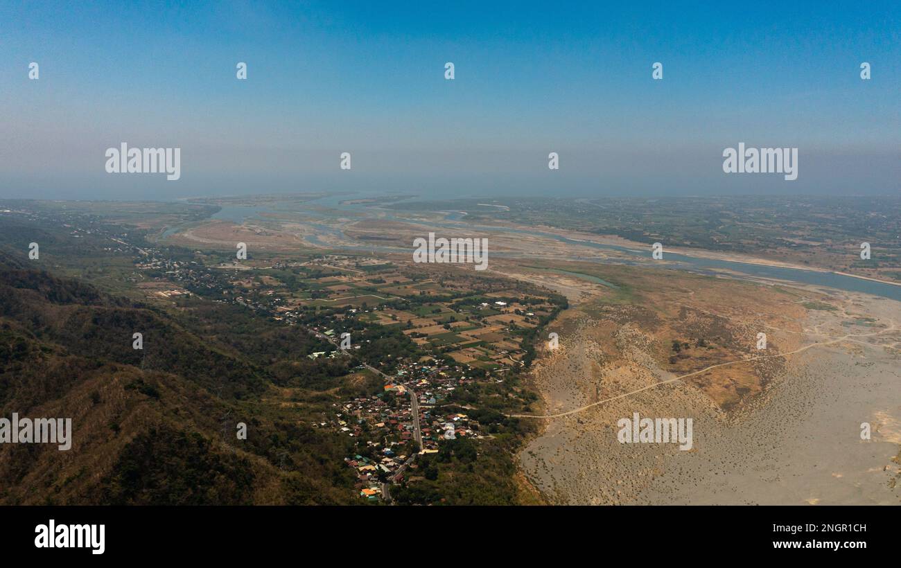 River in the countryside with farmland and agricultural land view from ...