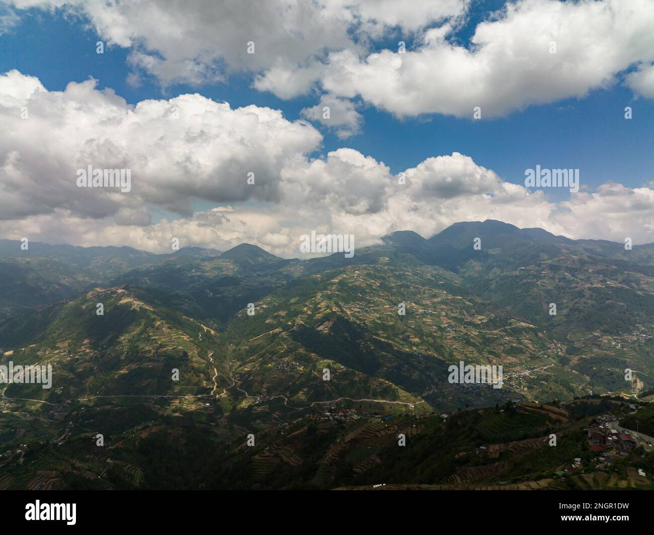 Agricultural plantations and rice terraces on hillsides in a ...