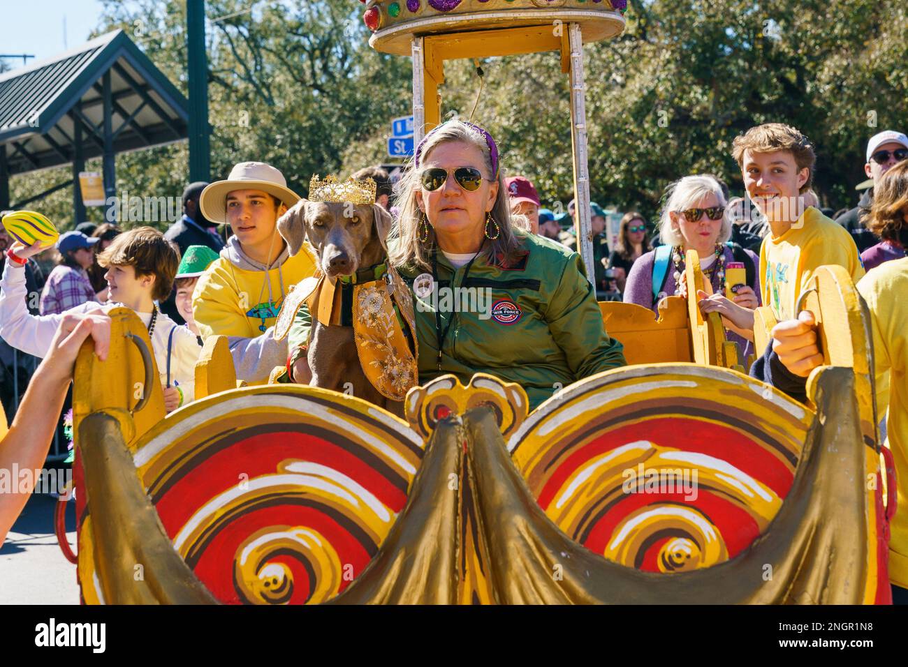 Dogs and their owners are seen at the Krewe Of Barkus parade on Sunday ...