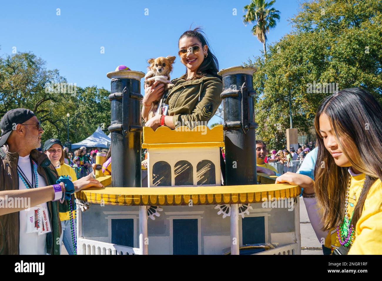 Dogs and their owners are seen at the Krewe Of Barkus parade on Sunday ...