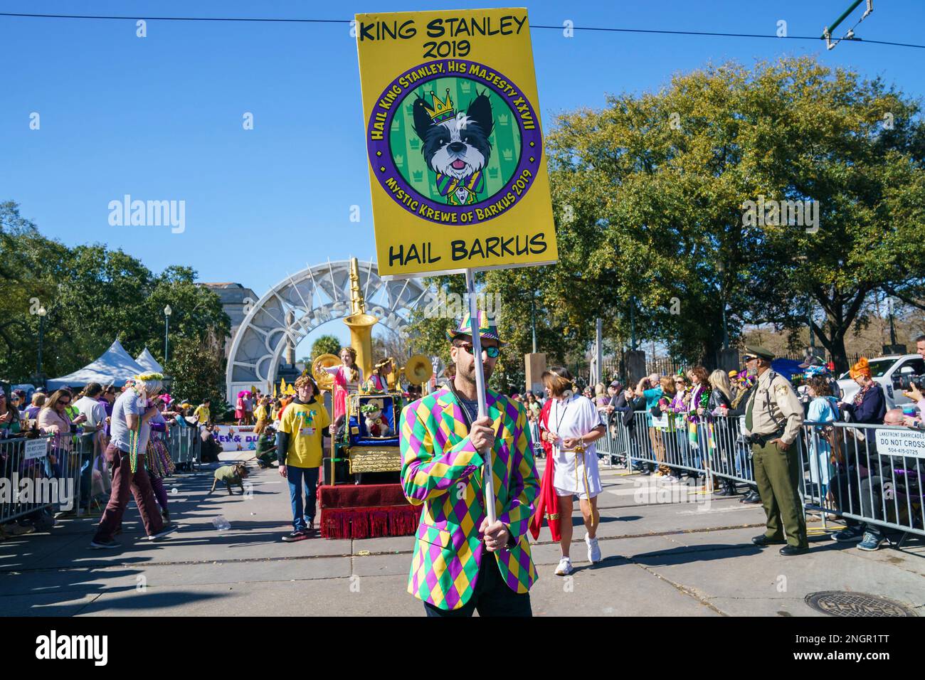 Dogs and their owners are seen at the Krewe Of Barkus parade on Sunday ...