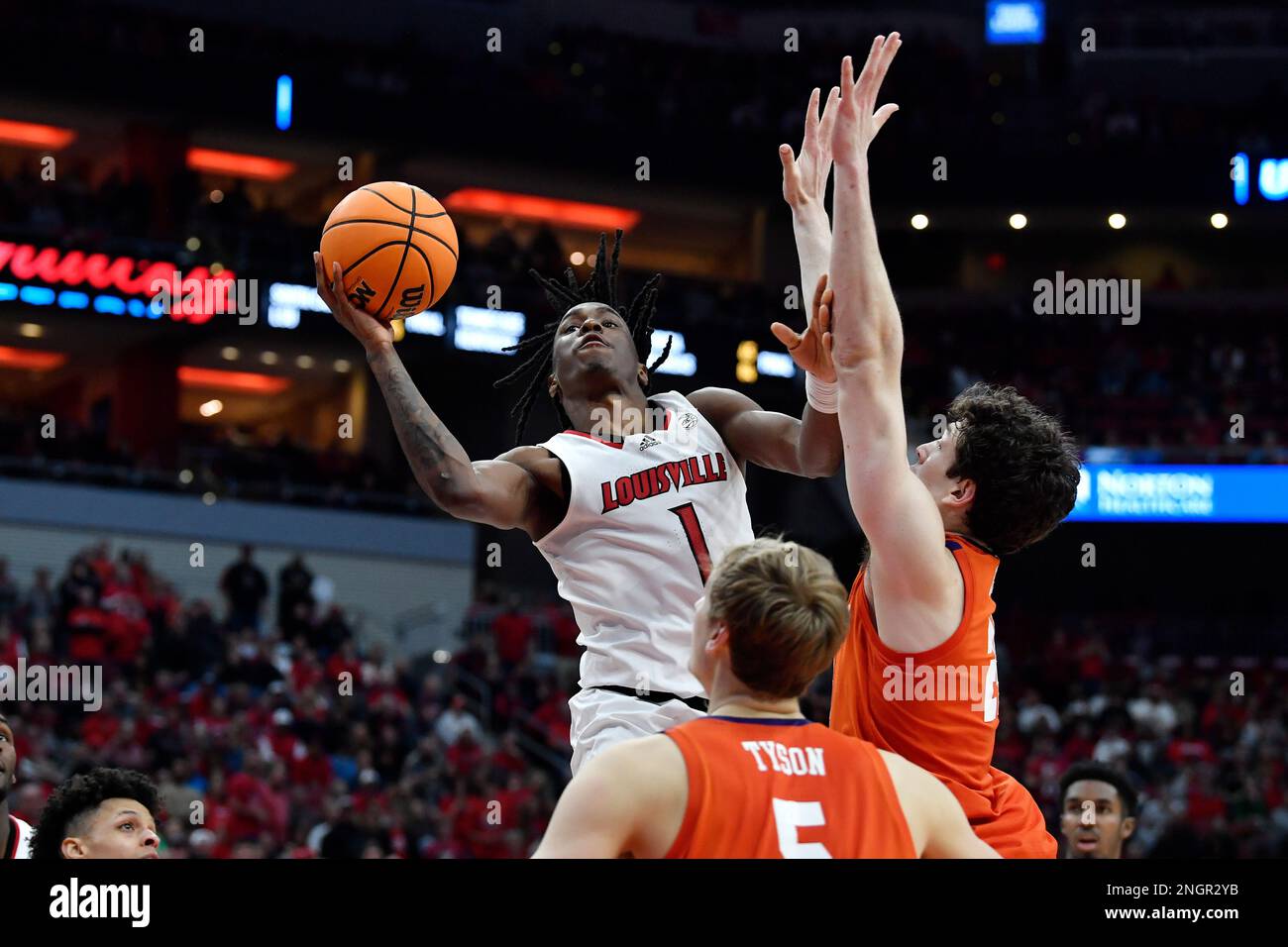 Louisville guard Mike James (1) shoots against Clemson forward Hunter ...
