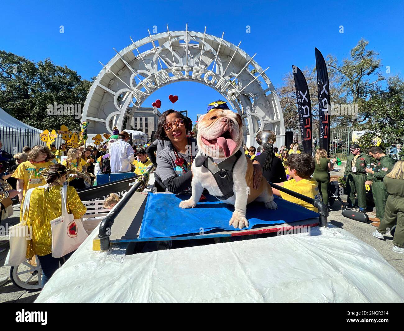 Dogs and their owners are seen at the Krewe Of Barkus parade on Sunday ...