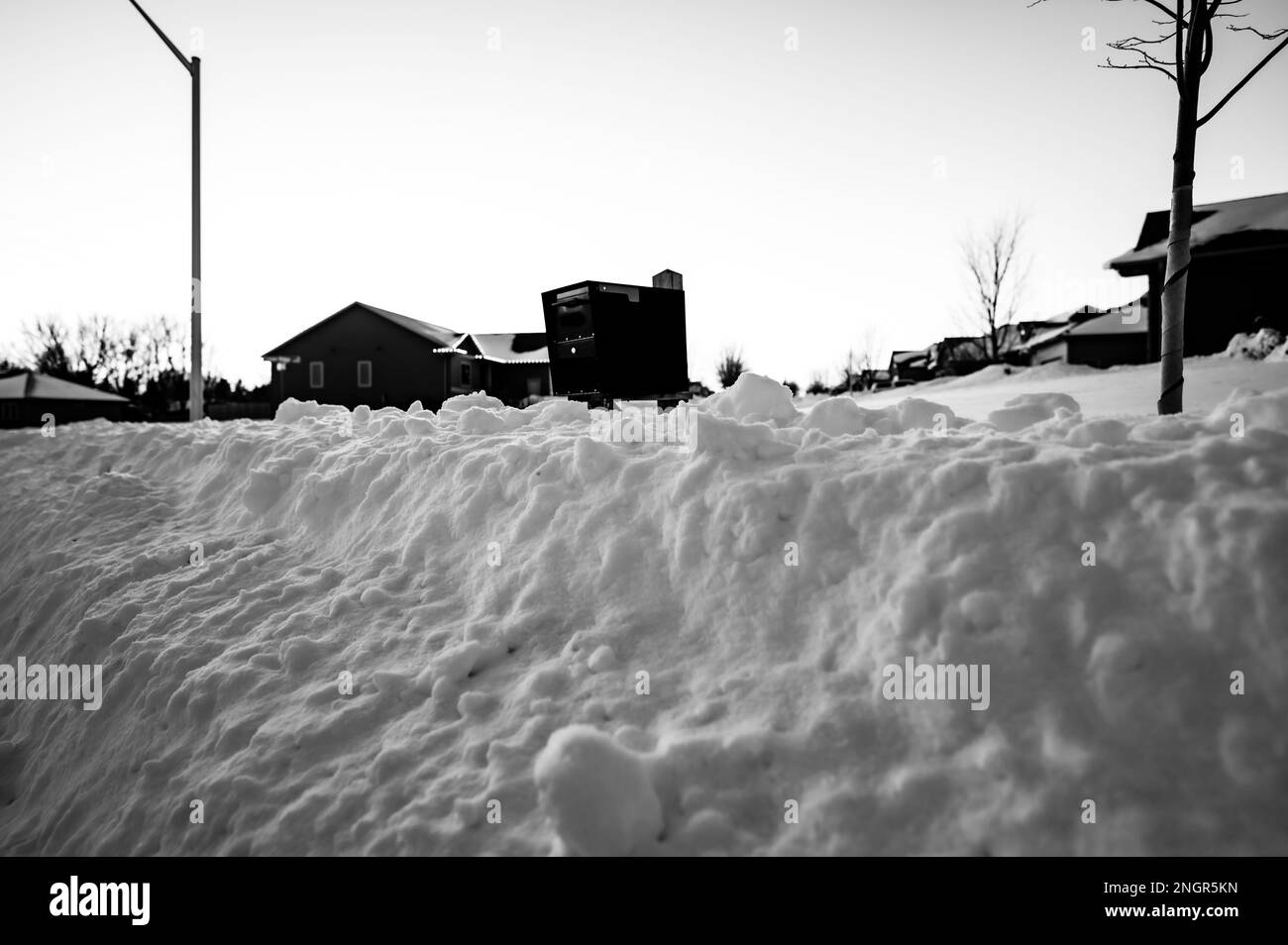 Residential mailbox blocked by a snow pile left by a plow after ...