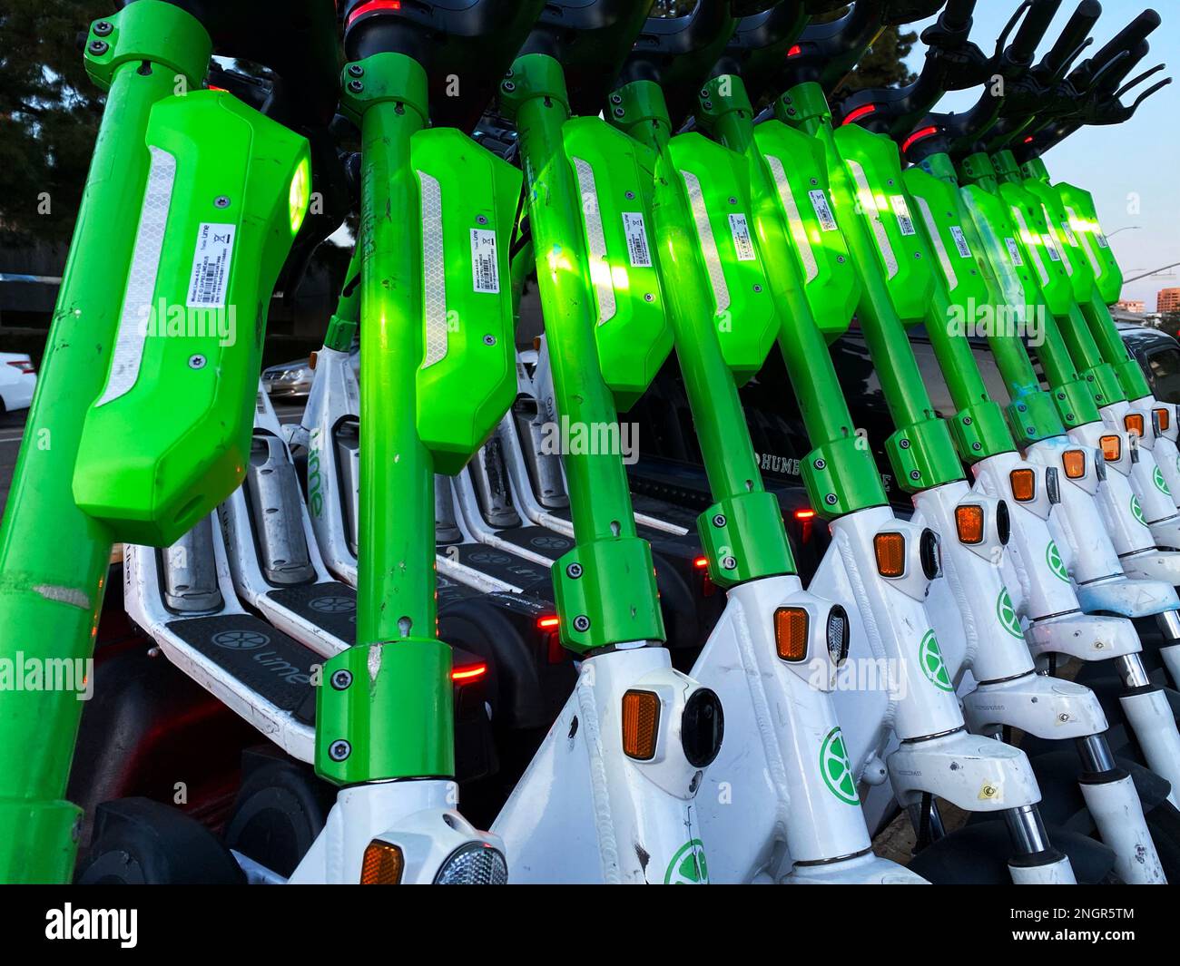Lime scooters stacked on a truck Stock Photo - Alamy
