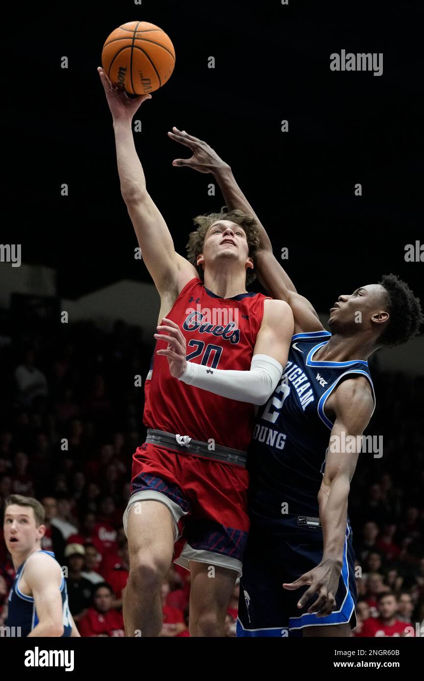 Saint Mary's guard Aidan Mahaney, left, shoots against BYU guard Jaxson ...
