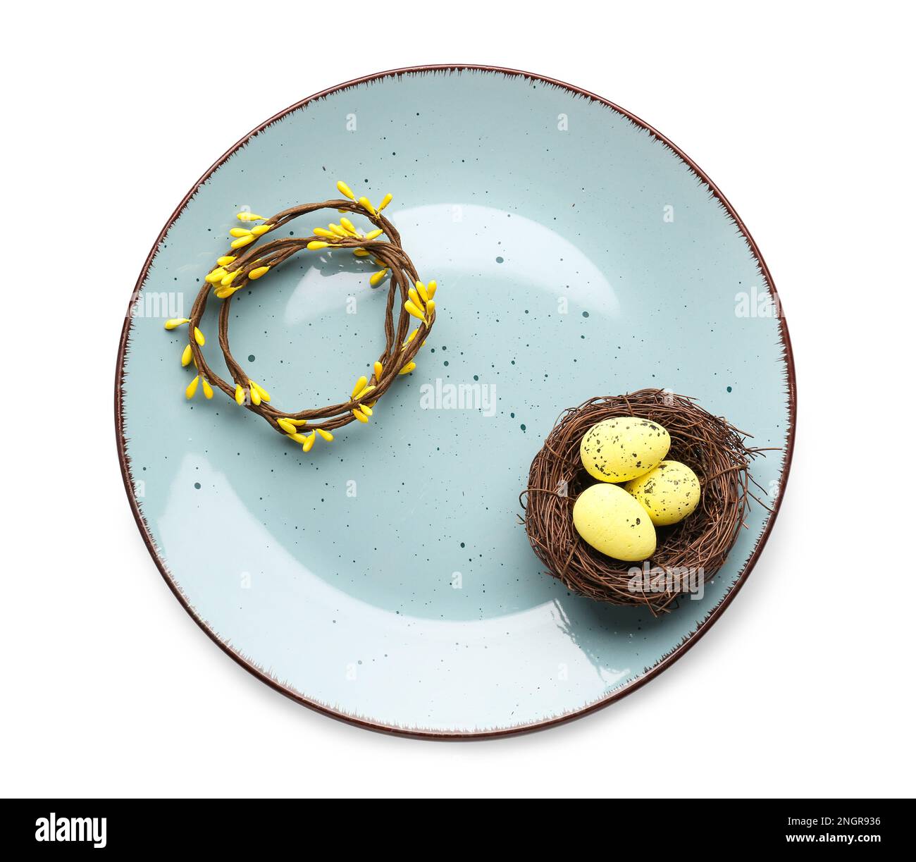 Table setting with Easter eggs in nest isolated on white background ...