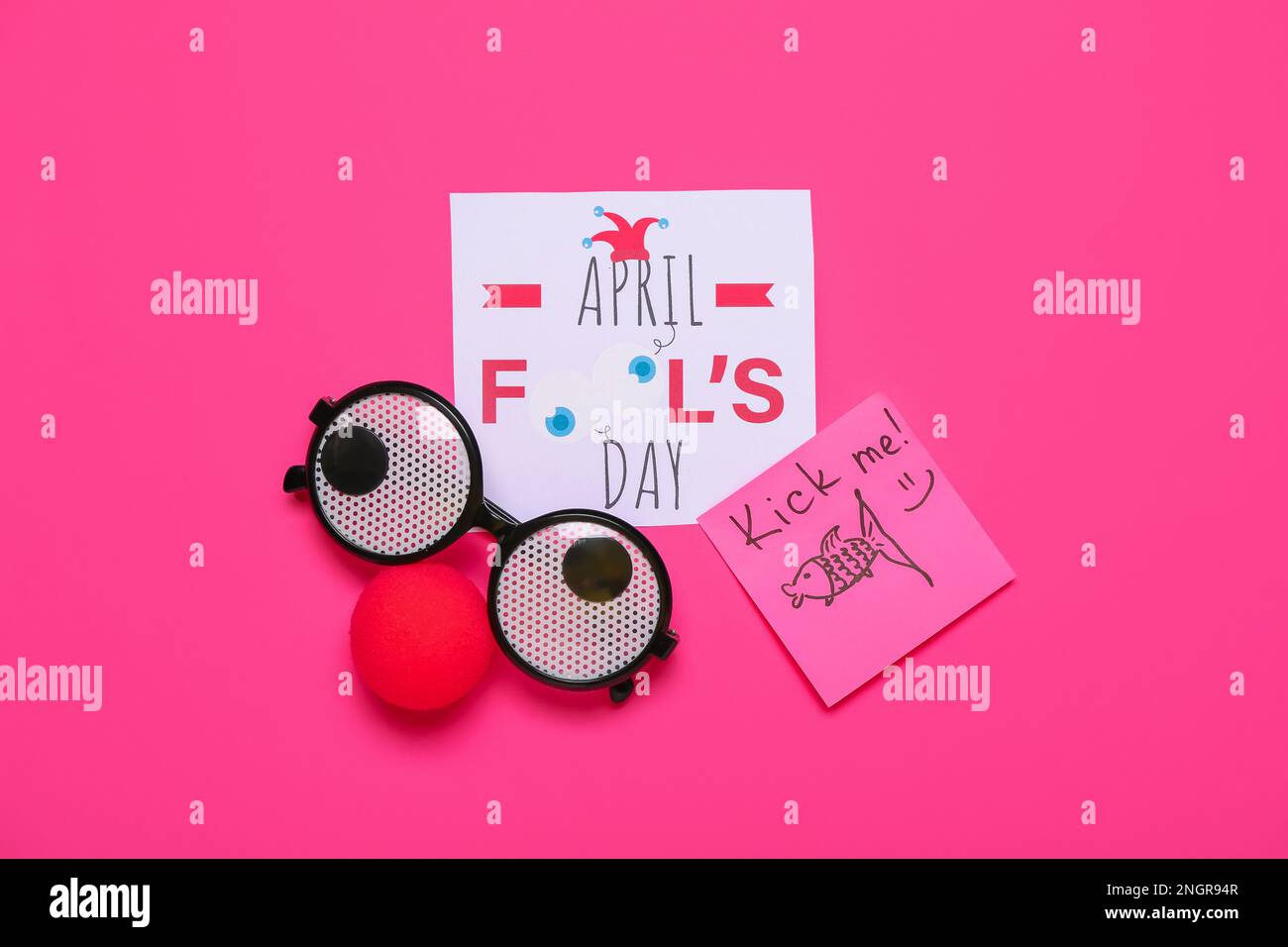 Card with text APRIL FOOL'S DAY, eyeglasses and clown nose on pink ...