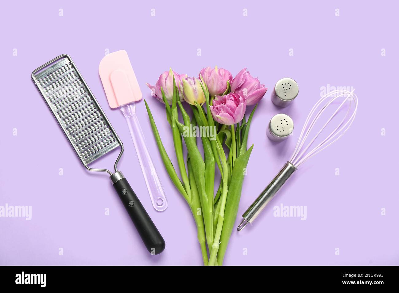 Kitchen utensils with tulips on lilac background. Hello spring Stock ...
