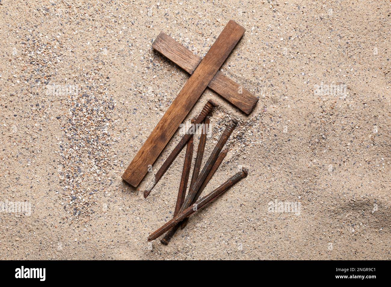 Wooden cross with nails on sand. Good Friday concept Stock Photo - Alamy