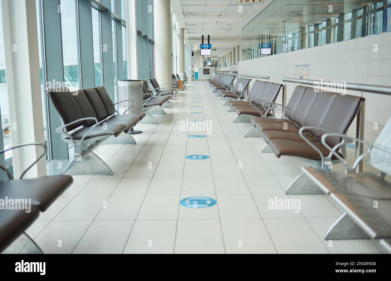 Empty lounge space in airport with chair, waiting room and global ...