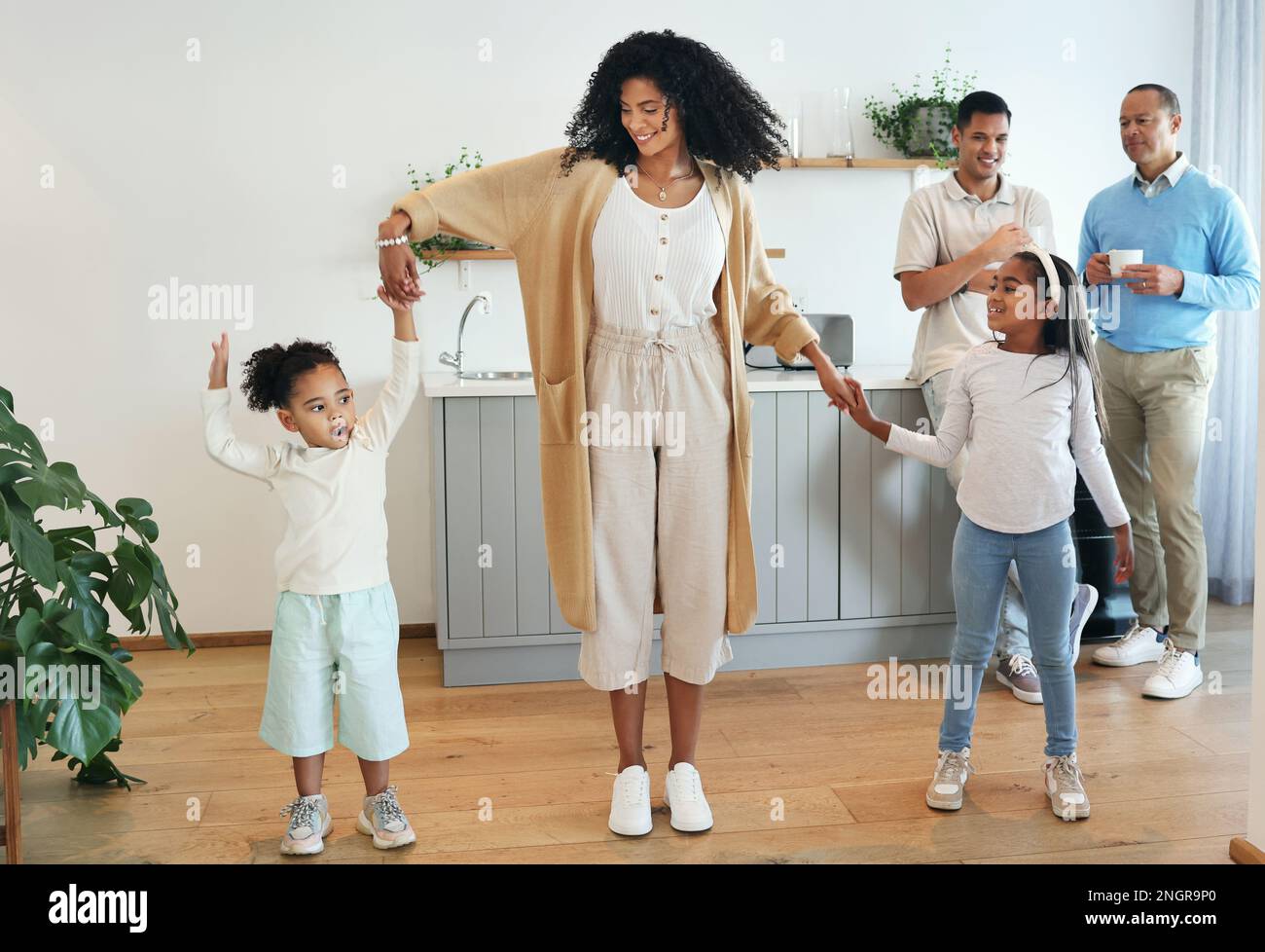 Happy, dance and relax with big family in kitchen for bonding, weekend ...