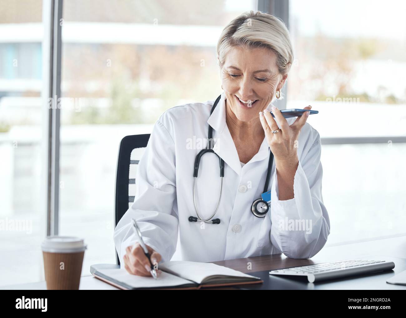 Woman, doctor and speaker phone, call and schedule appointment with ...