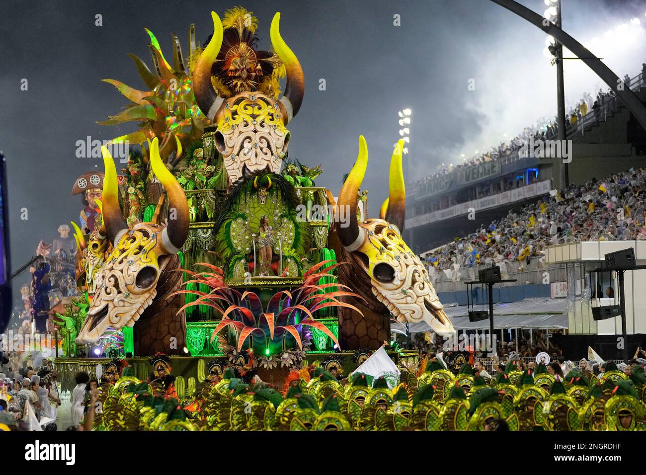 Dancers from the Mancha Verde samba school perform on a float during a ...