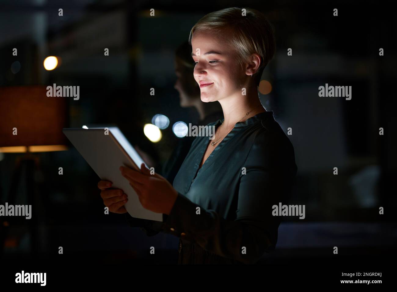 Work, overtime and woman with tablet, smile and internet search ...