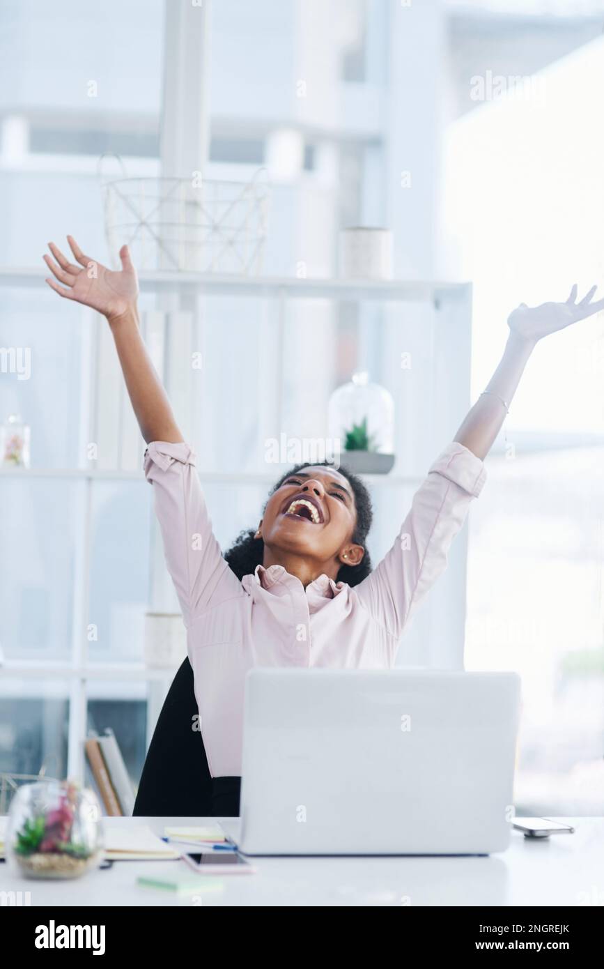 Success Has Her Feeling Overjoyed A Young Businesswoman Cheering While Working In An Office