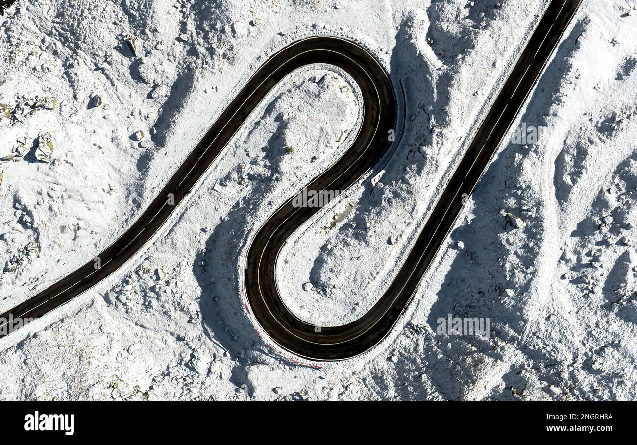 Aerial view of a twisted road in winter transfagarasan romania. Curvy ...