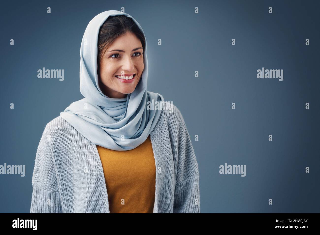Shes looking forward to the future. an attractive young woman looking ...