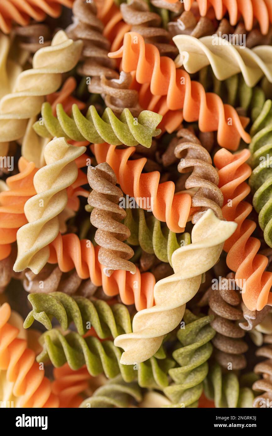 A variety of fusilli pasta made from different types of legumes, green ...