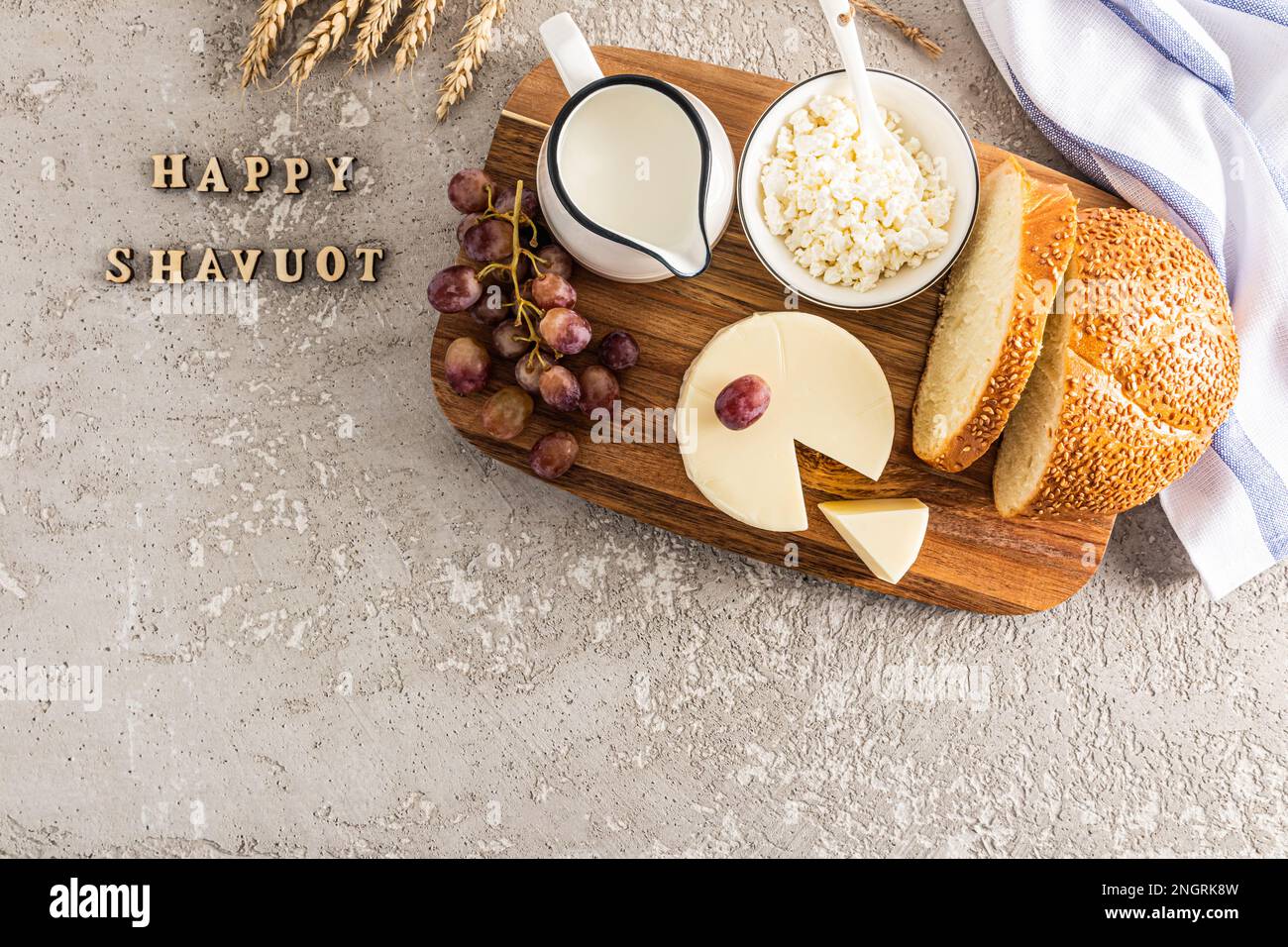the feast of the giving of the Torah. dairy products, bread, grapes. the concept of the Jewish ...