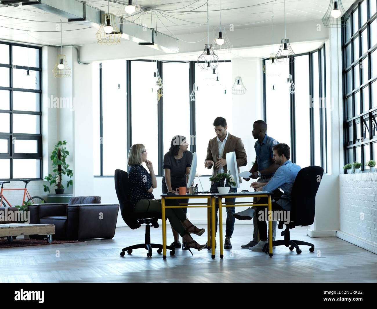 Teamwork, strategy and coaching with business people in meeting for ...