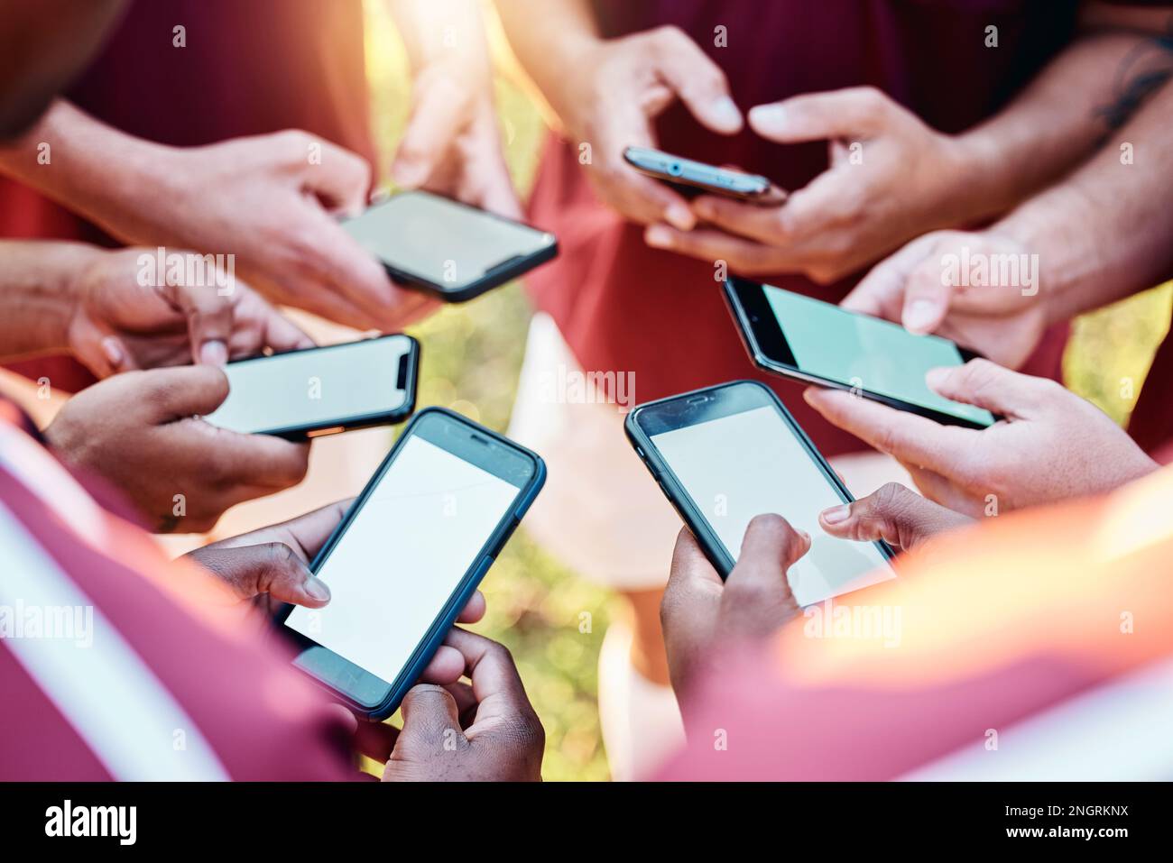 Hands, phone and networking on mockup screen in sports collaboration ...