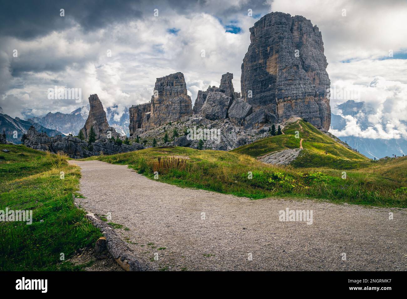 Beautiful wide gravelly hiking trail around the Cinque Torri cliff ...