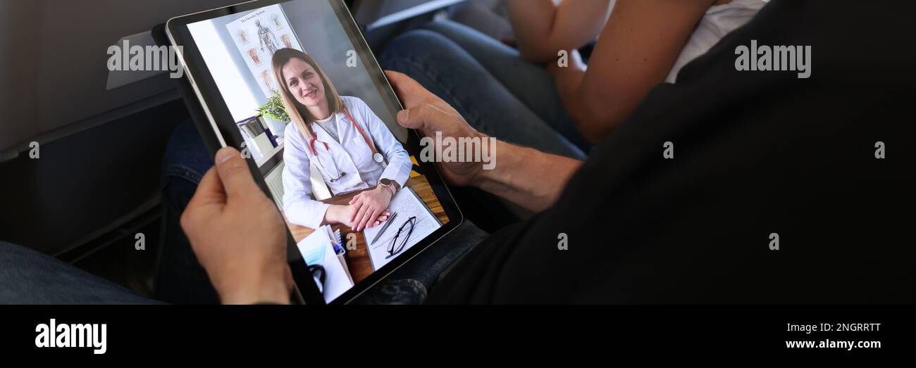 Airplane passengers communicate with doctor remotely via video call ...