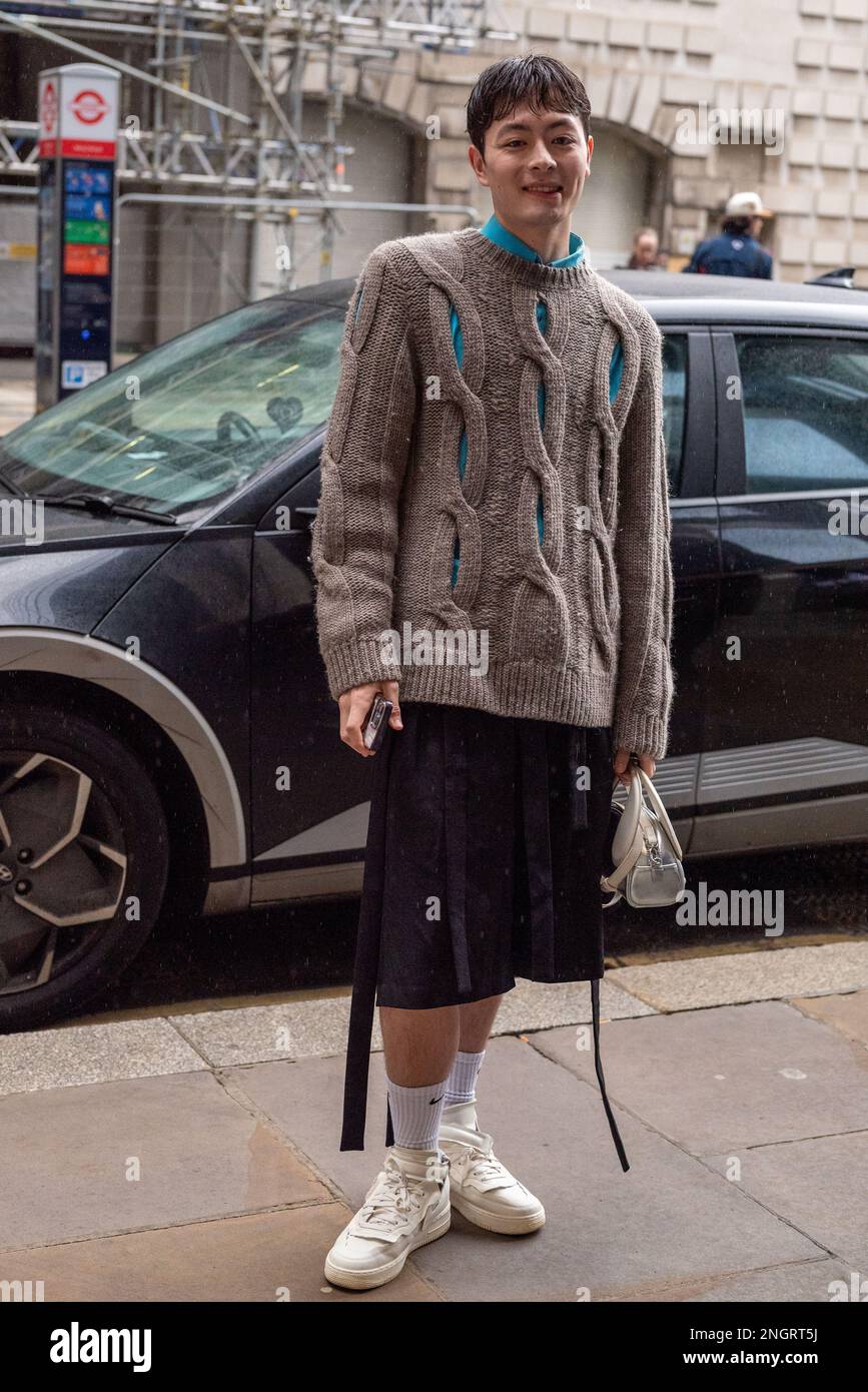 A guest is photographed outside the David Koma show on the second day ...