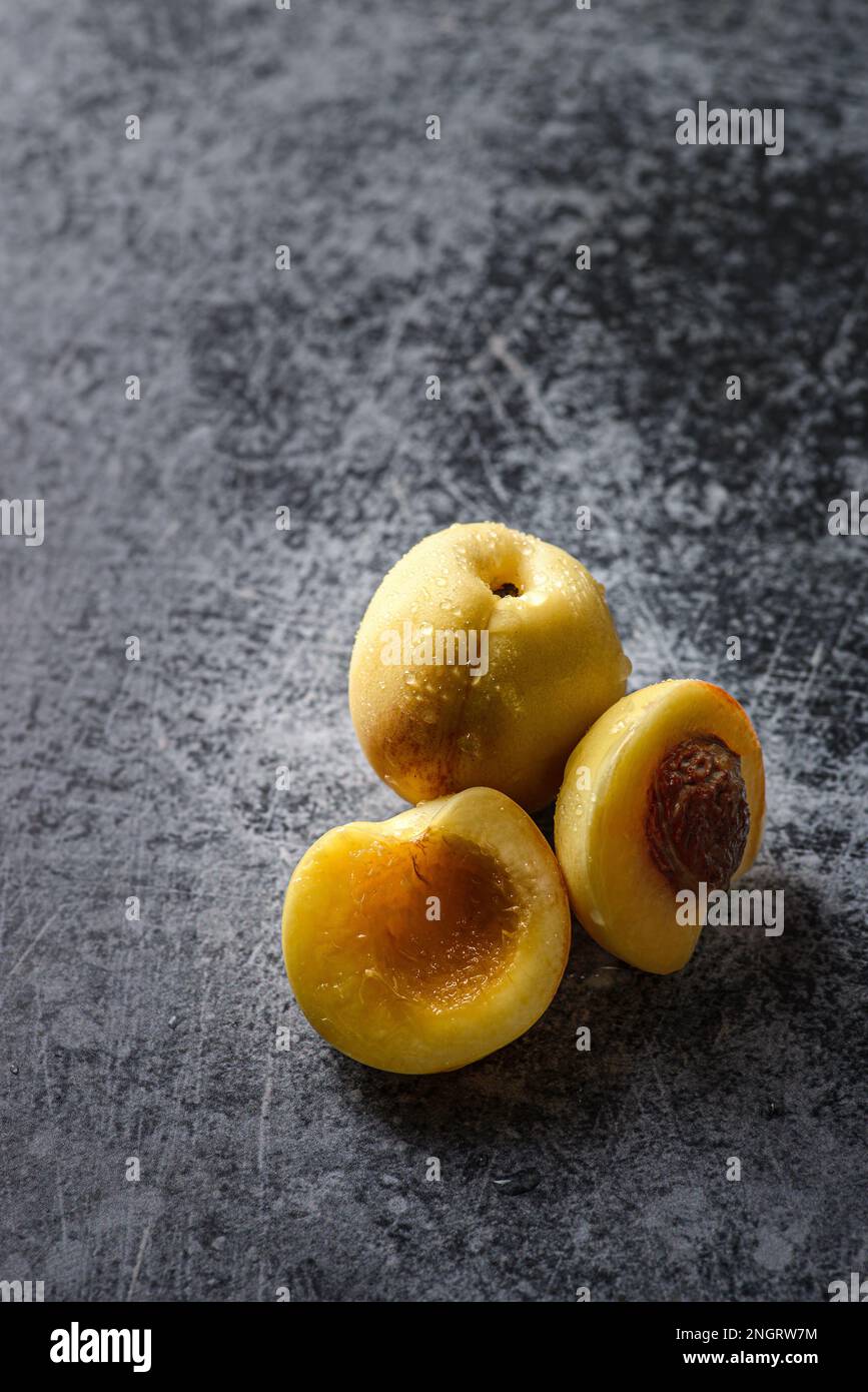 Apricots in basket dark background hi-res stock photography and images ...