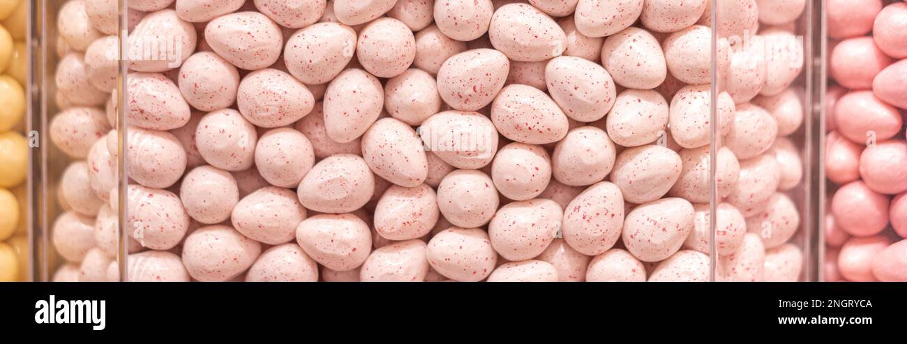 Pastel pink candies in a shop window Stock Photo - Alamy