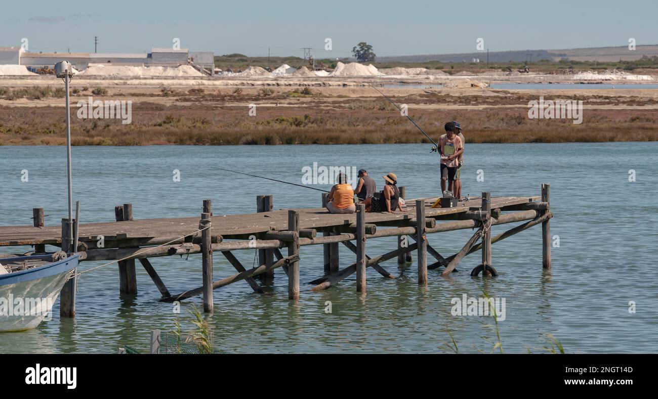 Velddrif, west coast South Africa. 2023. People fishing from an old ...