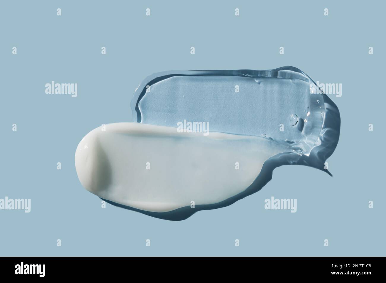 White cream and transparent gel texture on a blue background. Skin care ...