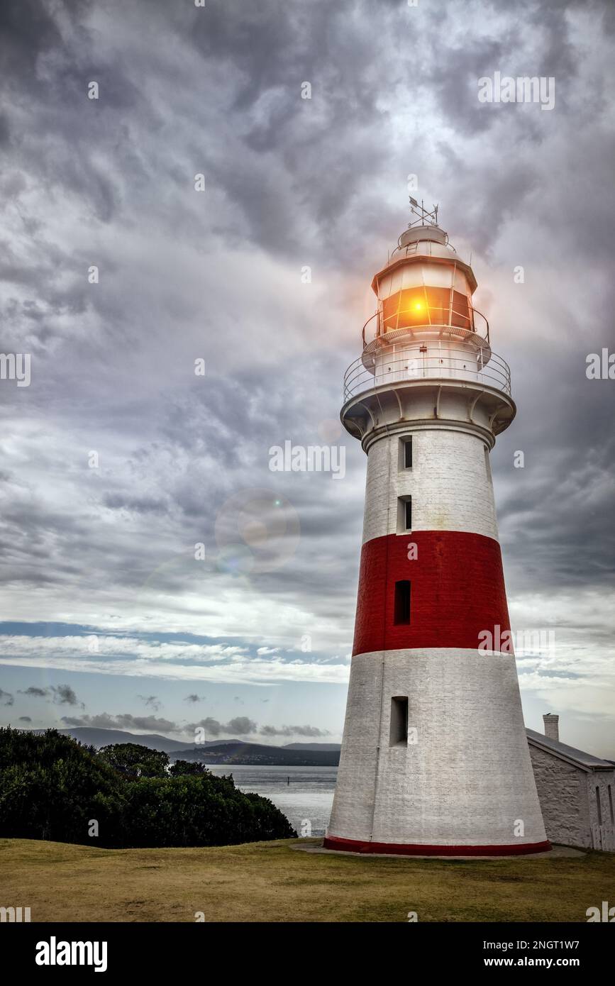 Low Head Lighthouse as a storm rolls in. Situated on the mouth of the ...