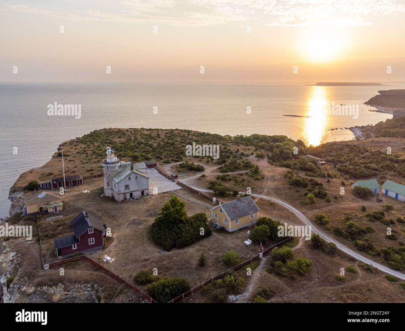 Stone lighthouse building in summer afternoon sun on Stora Karlso ...