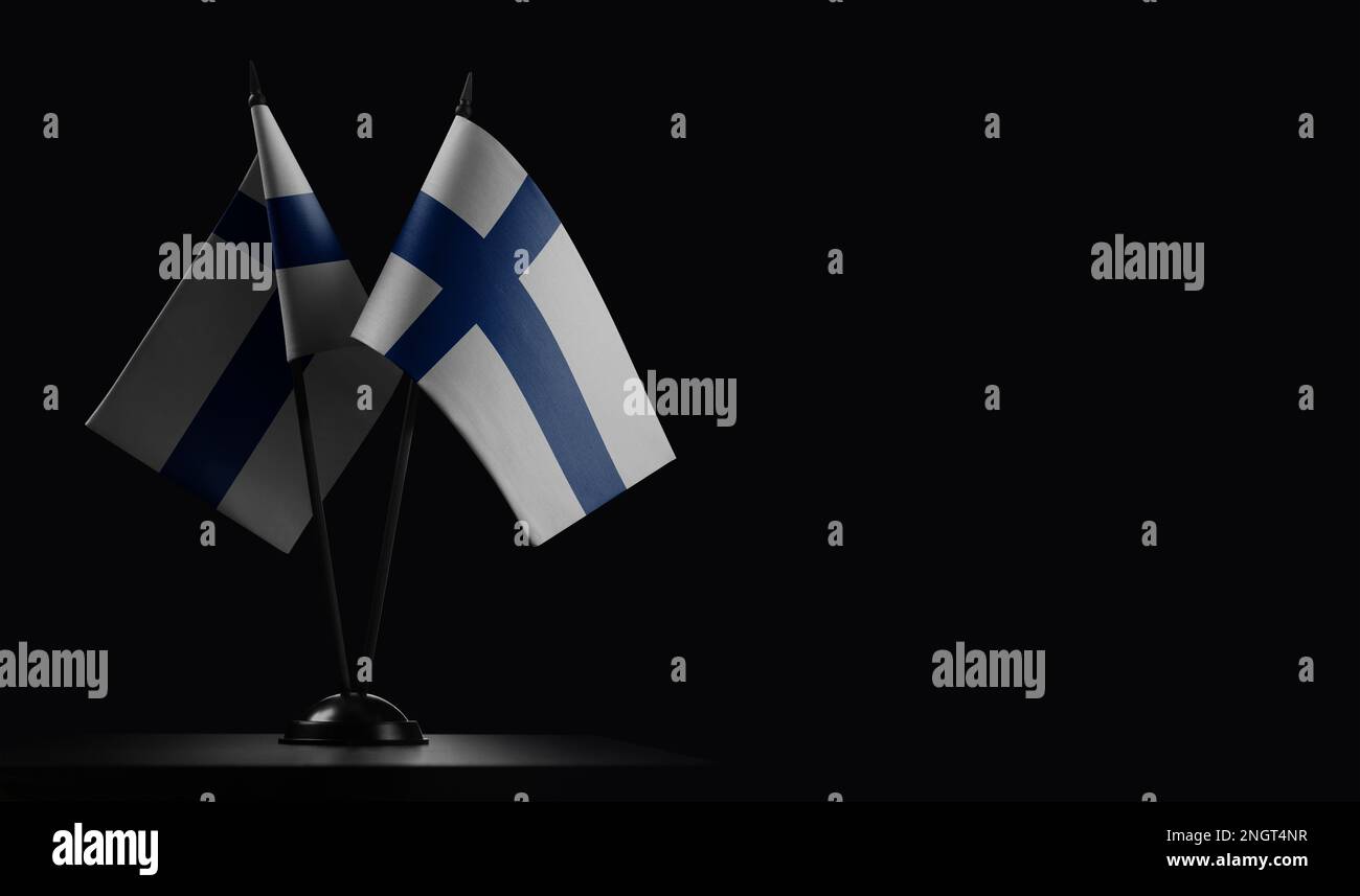 Small national flags of the Finland on a black background Stock Photo ...