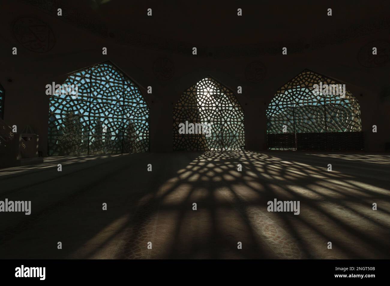 Islamic photo. Shadows of the decoration of window of a mosque. Ramadan ...