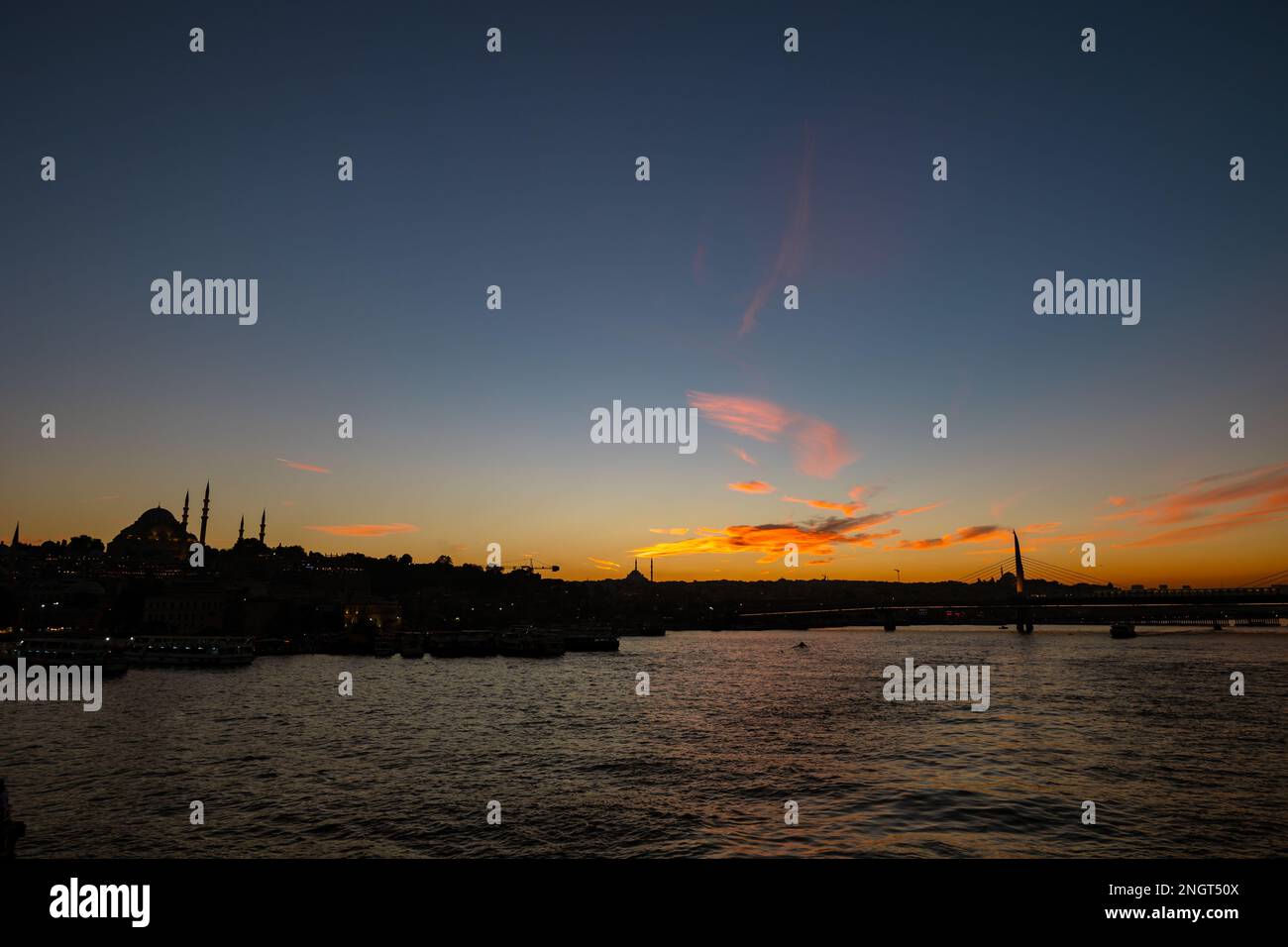 Istanbul skyline. Silhouette of Istanbul at sunset from Galata Bridge ...