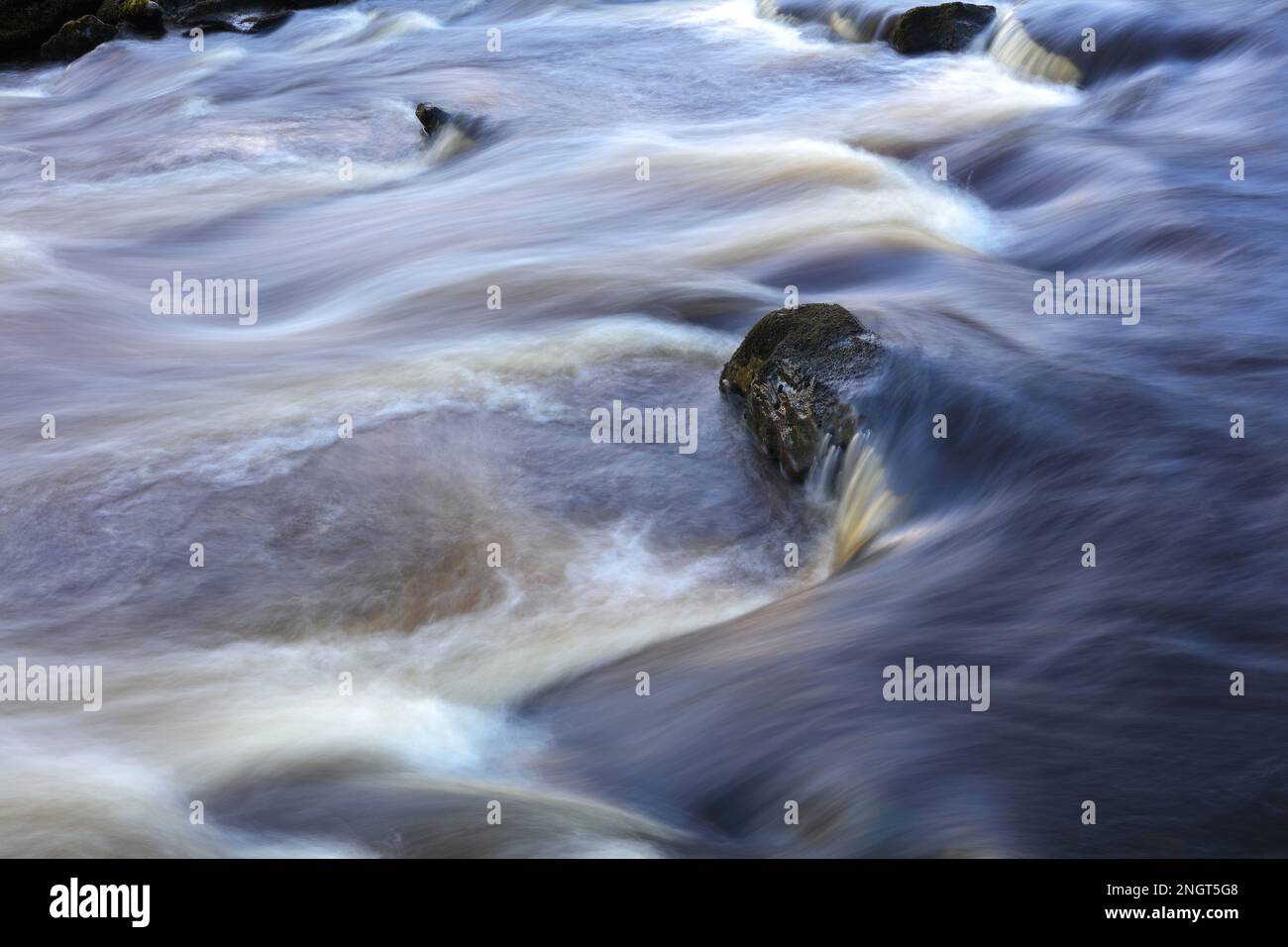 Close up image of a stream showing motion blur, Rookhope Burn, County ...