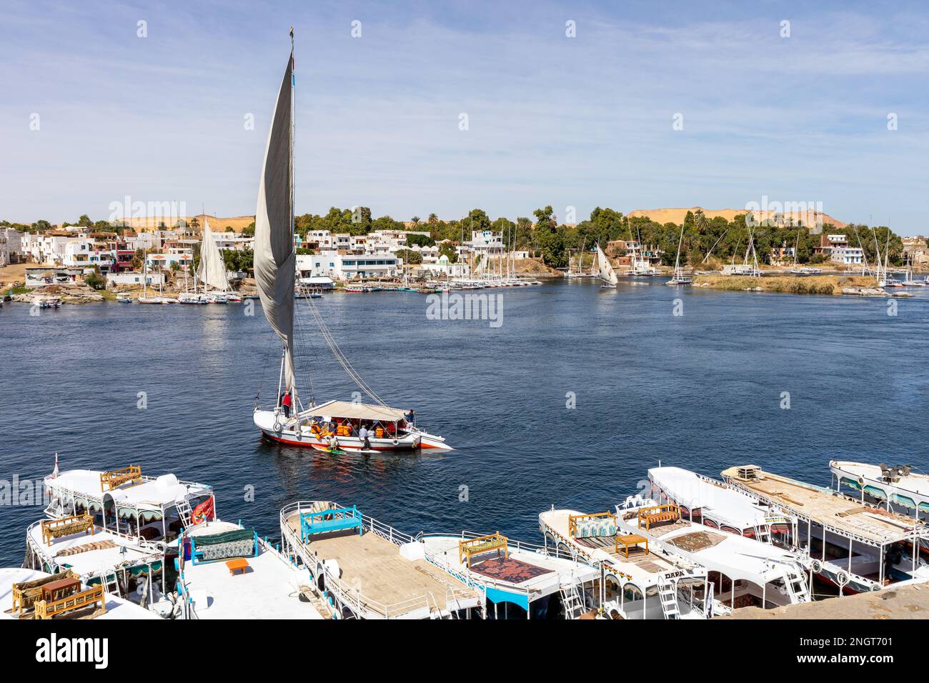 Felucca Sailing on the Nile River in Aswan. Popular Tourist Sailboat in ...