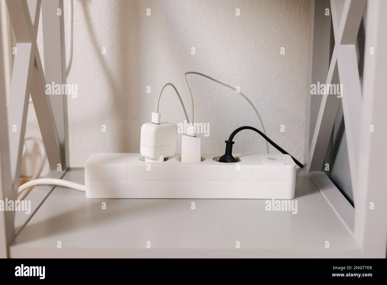 Modern cable connector for overloaded power boards at home. The ...