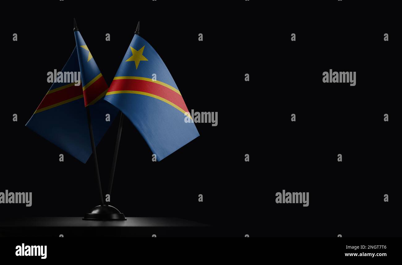 Small national flags of the Democratic Republic of the Congo on a black ...