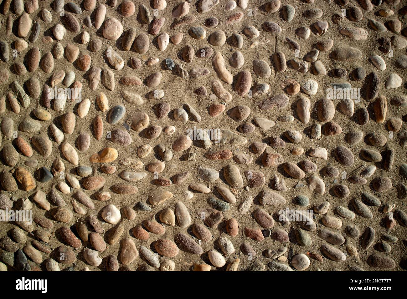 Photographic documentation of an outdoor floor made with river stones ...