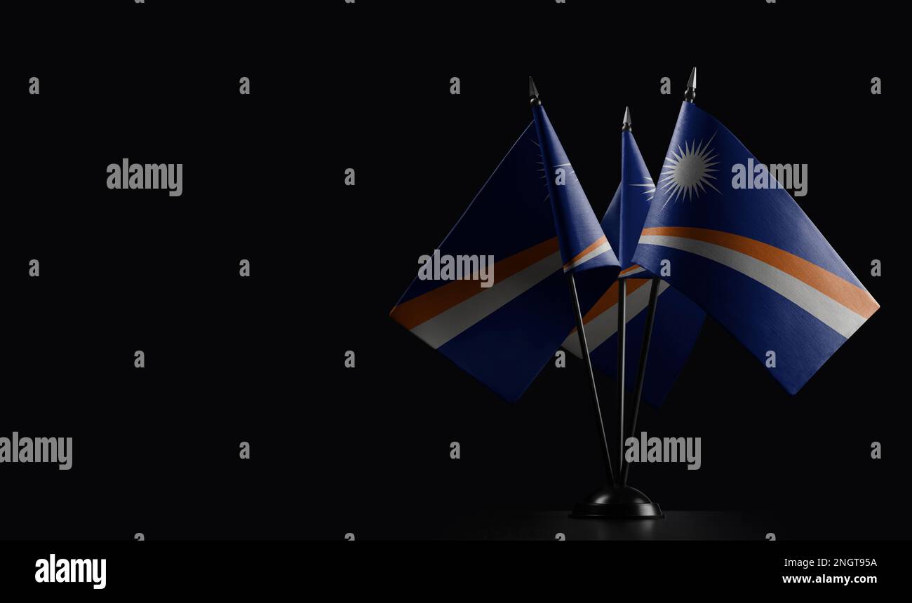 Small national flags of the Marshall on a black background Stock Photo ...