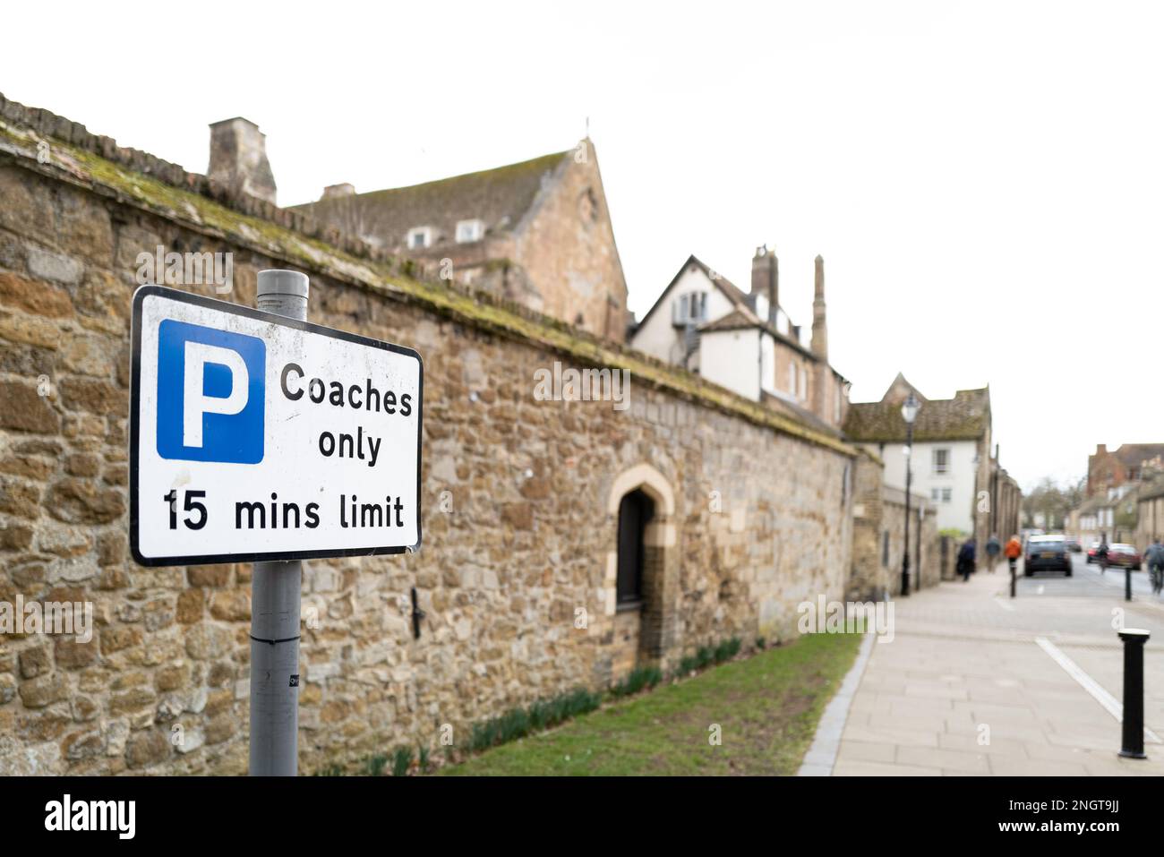 Shallow focus sign of a a Coach Only stop seen outside a historical ...