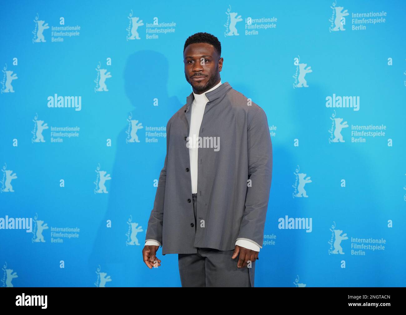 Berlin, Germany. 18th Feb, 2023. Actor Marchant Davis stands in front of the blue wall during ...